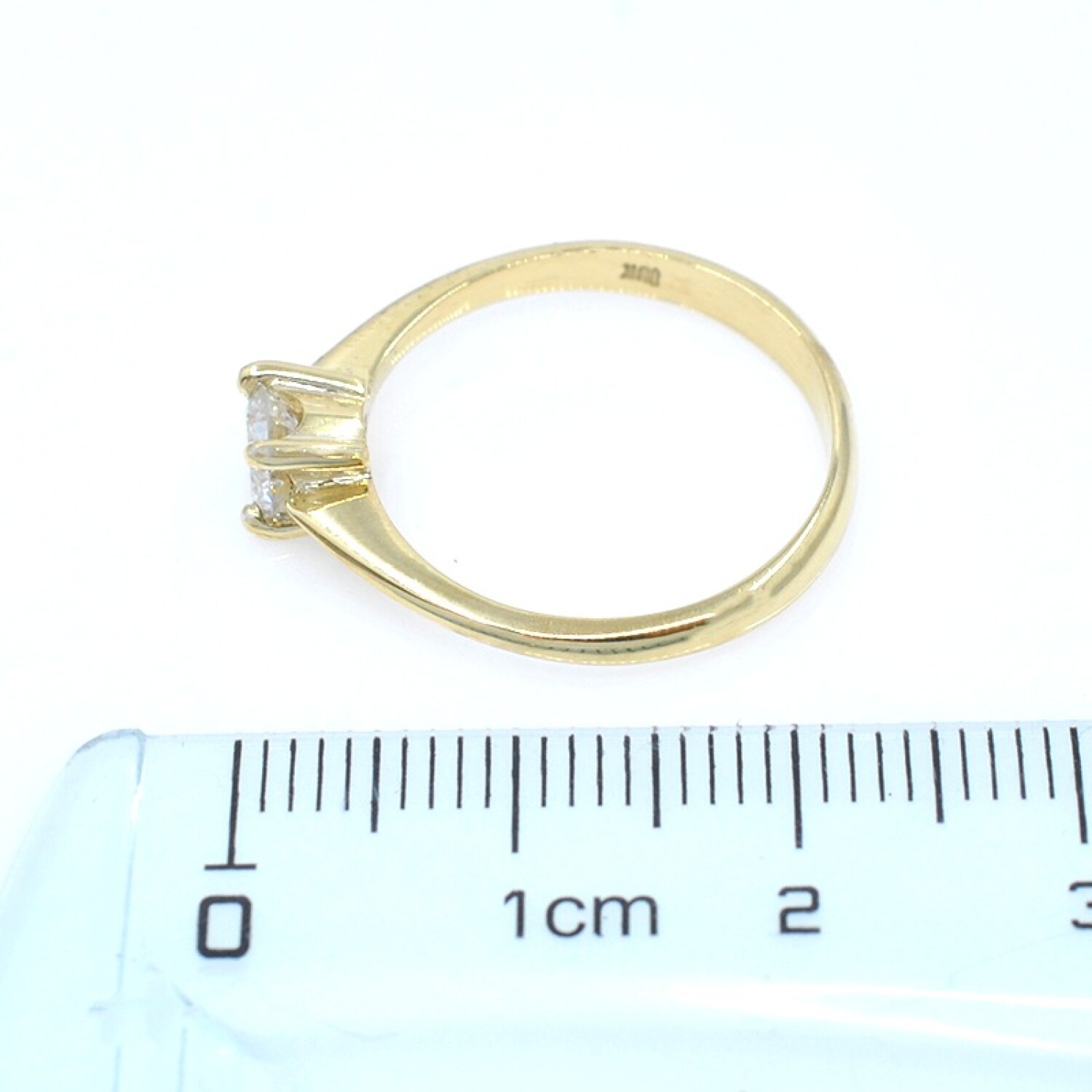 Anillo en oro 18k y brillante con engarce 4 puntas — Facello Joyeros