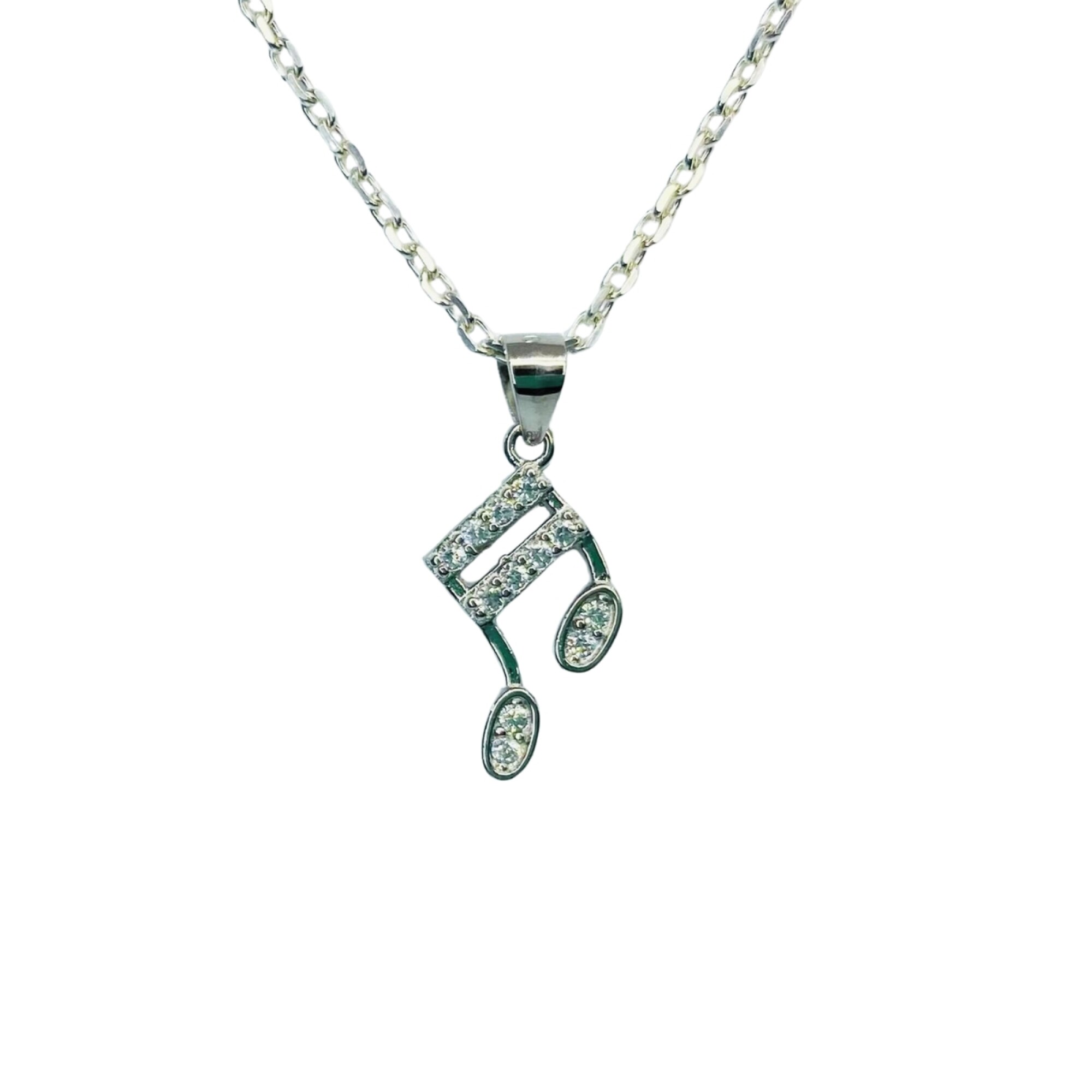 DIJE PLATA NOTA MUSICAL CON CIRCONIAS — La hora exacta