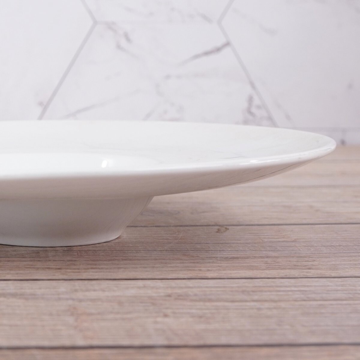 Plato hondo de ceramica con borde ancho — El Clon